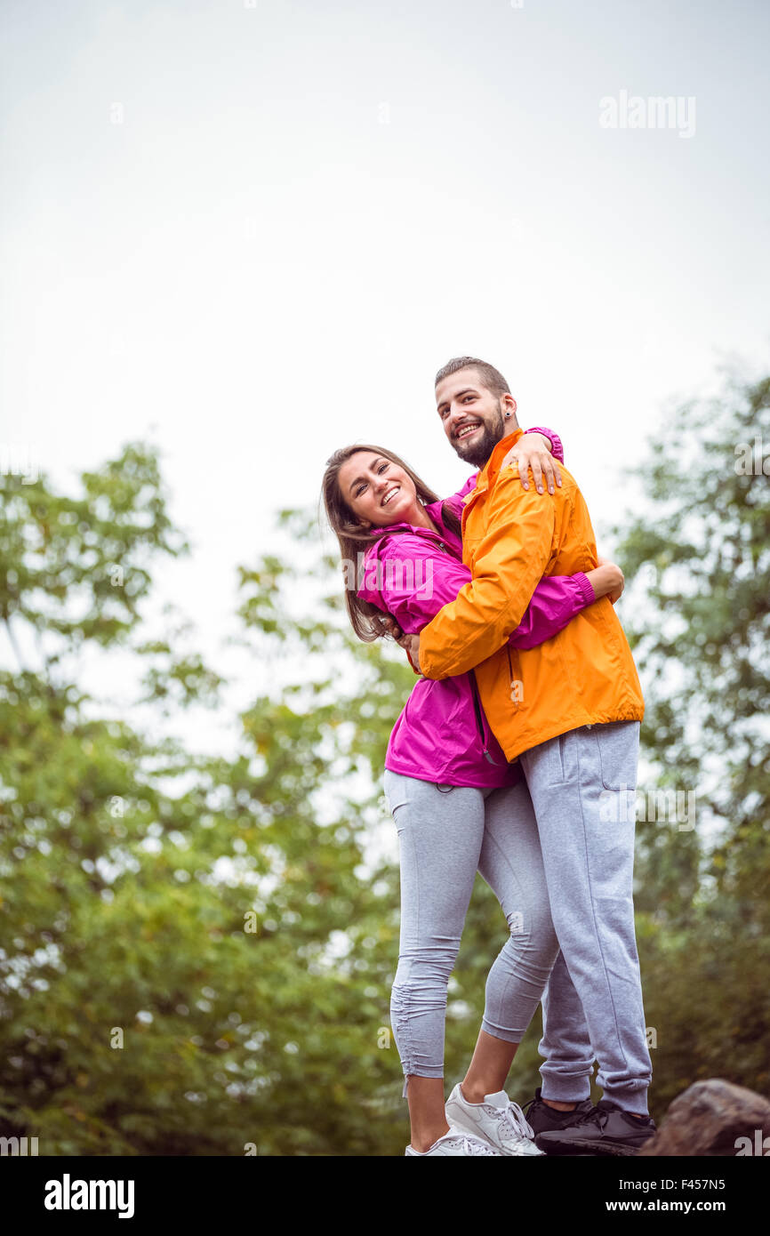 Happy couple on a hike Stock Photo - Alamy