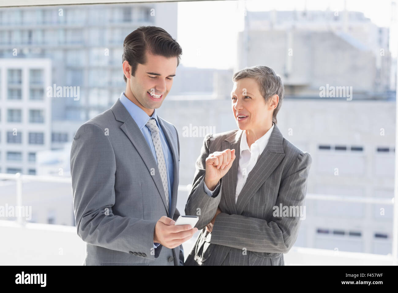 Colleagues having conversation hi-res stock photography and images - Alamy