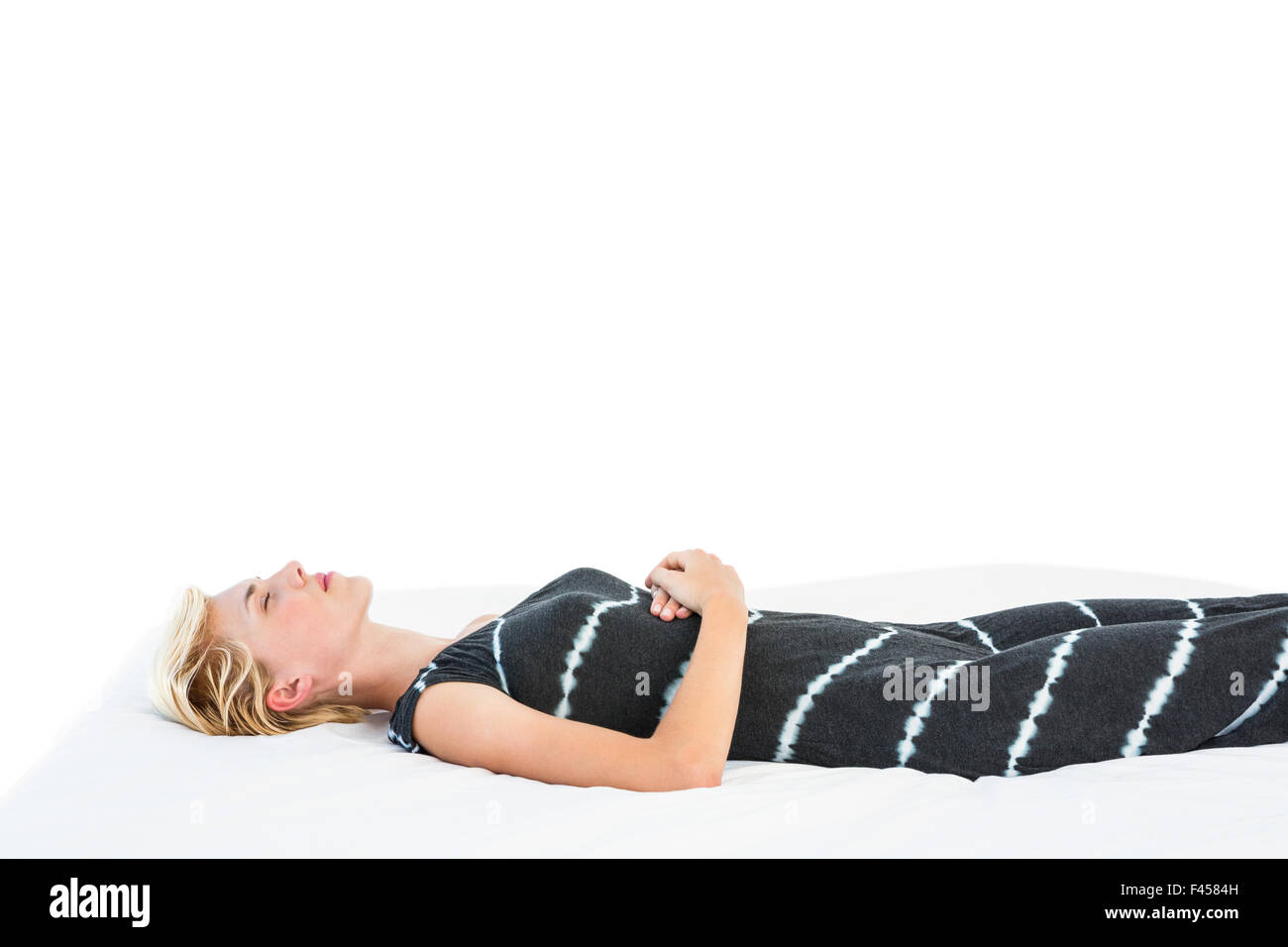 Attractive blonde woman napping Stock Photo - Alamy