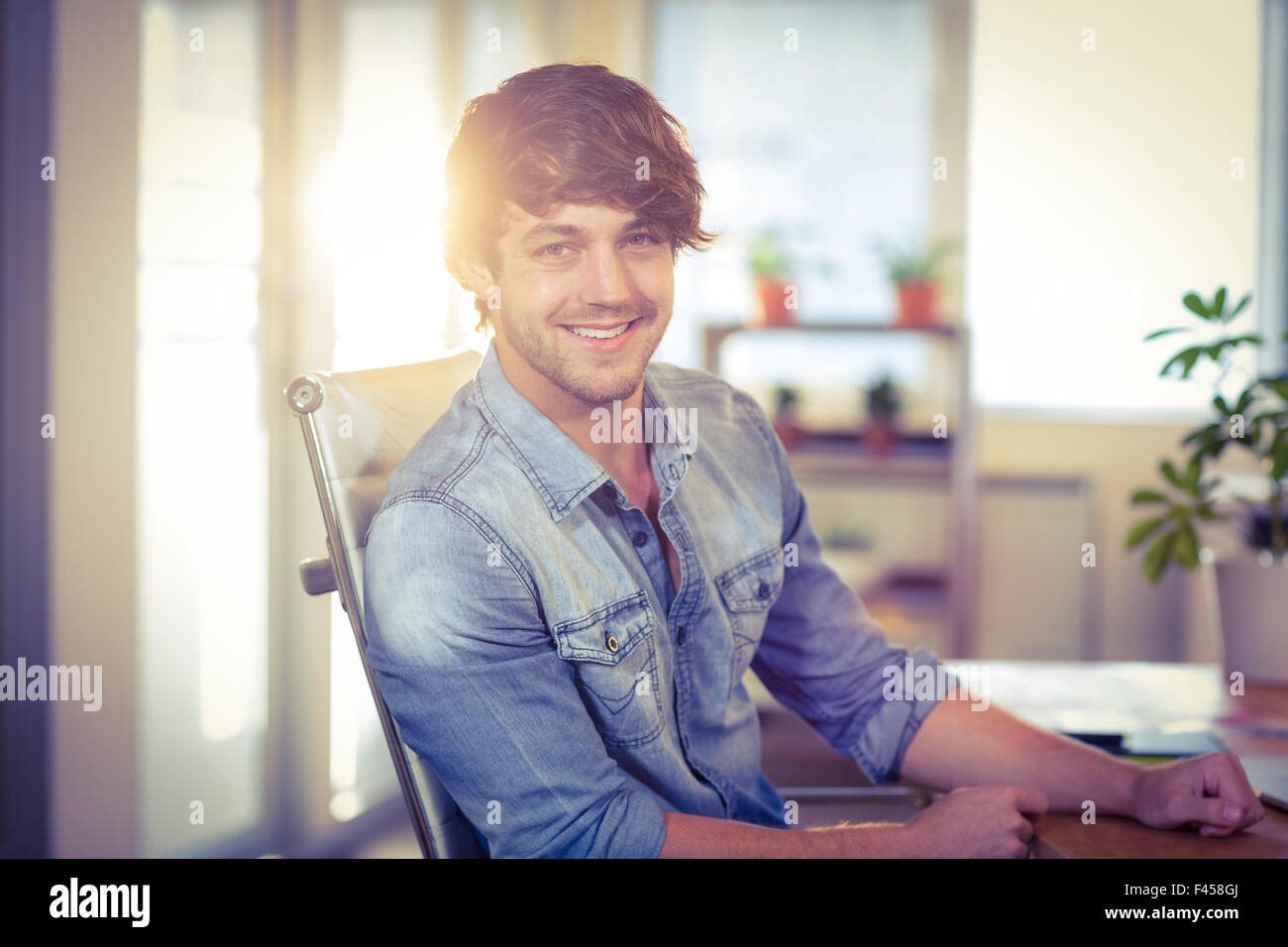 Cheerful designer smiling camera hi-res stock photography and images ...