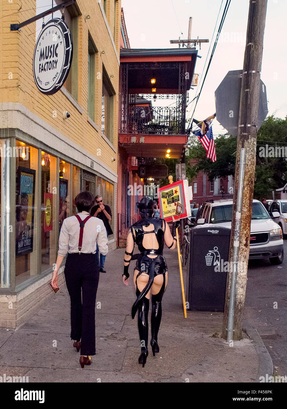 On Frenchmen Street in New Orleans, a scantily clad woman in a stylized ...
