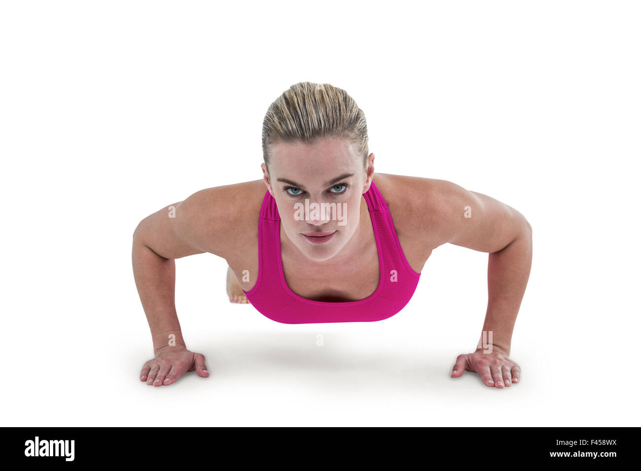 Beautiful woman doing push ups Cut Out Stock Images & Pictures - Alamy