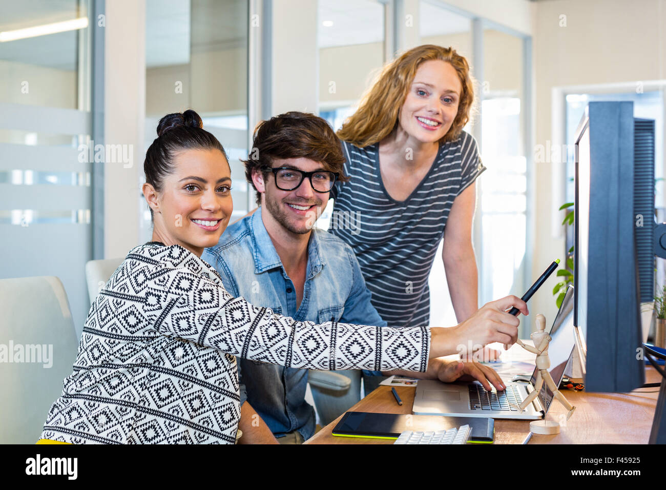 Professional designers working on computer Stock Photo - Alamy