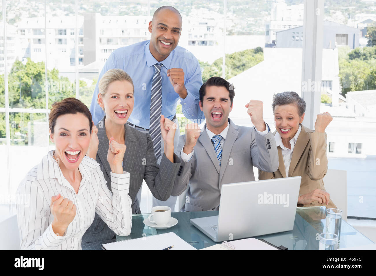 Business team celebrating a good job Stock Photo - Alamy