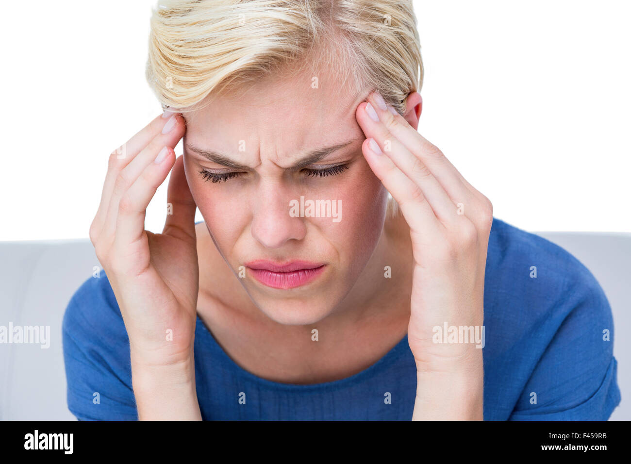 Attractive woman having headache Stock Photo - Alamy