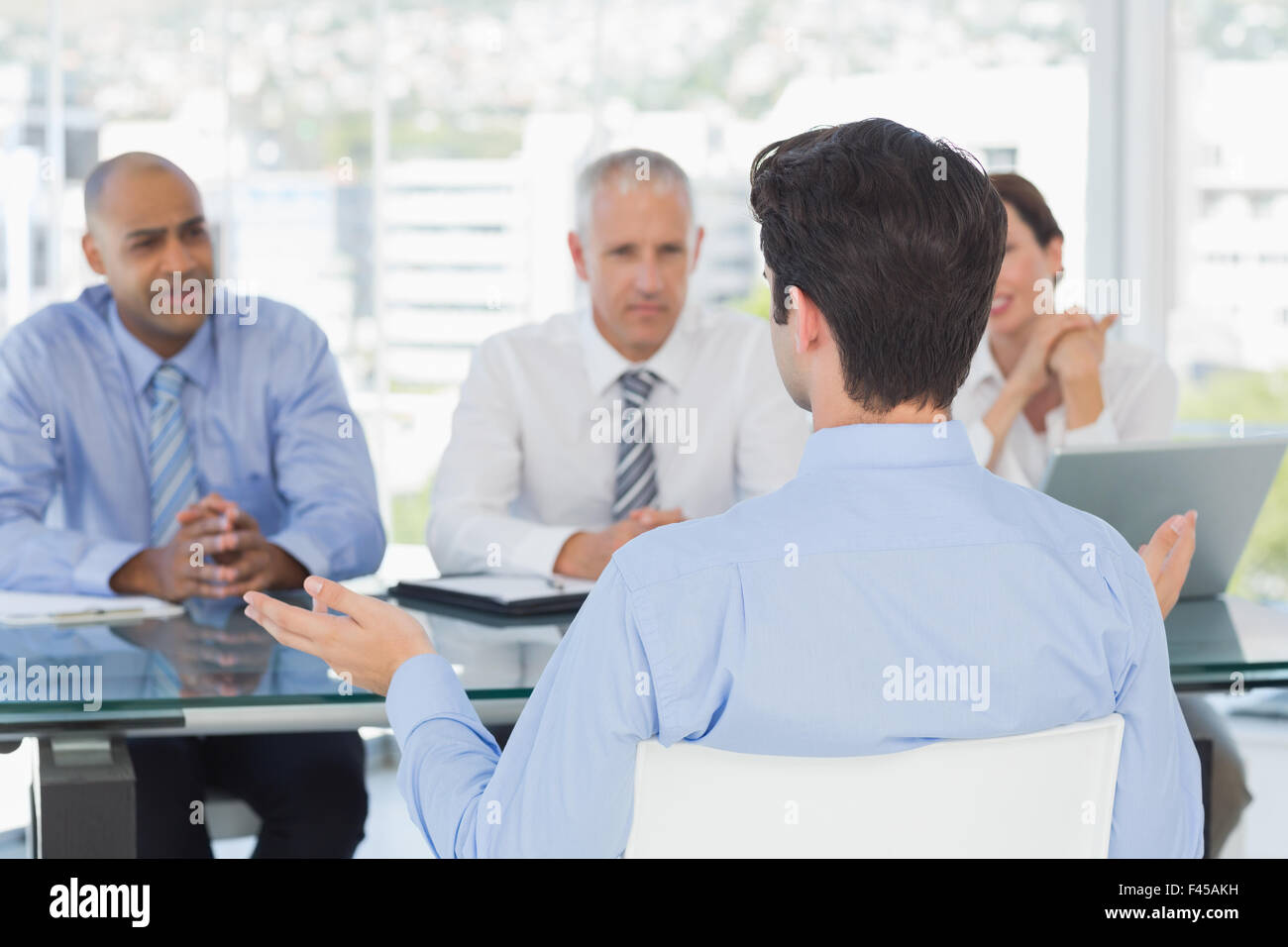 Businessman at work interview Stock Photo - Alamy