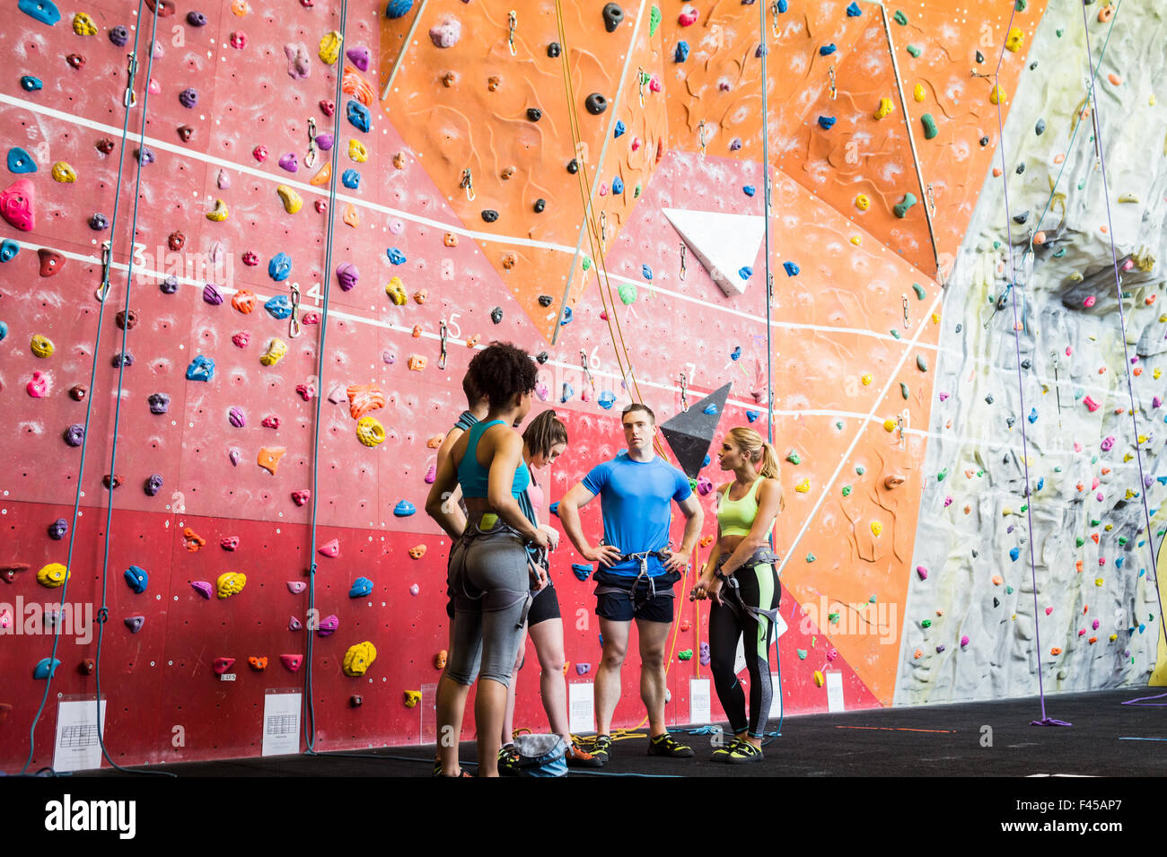 Fit people getting ready to rock climb Stock Photo - Alamy