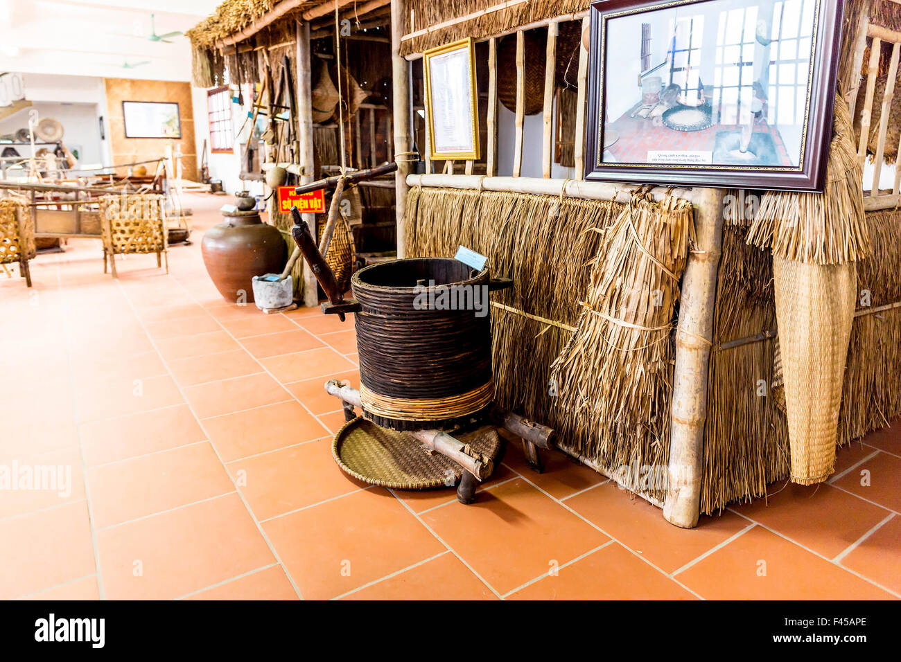 Ancient Vietnamese farming and fishing tools on display Stock Photo - Alamy