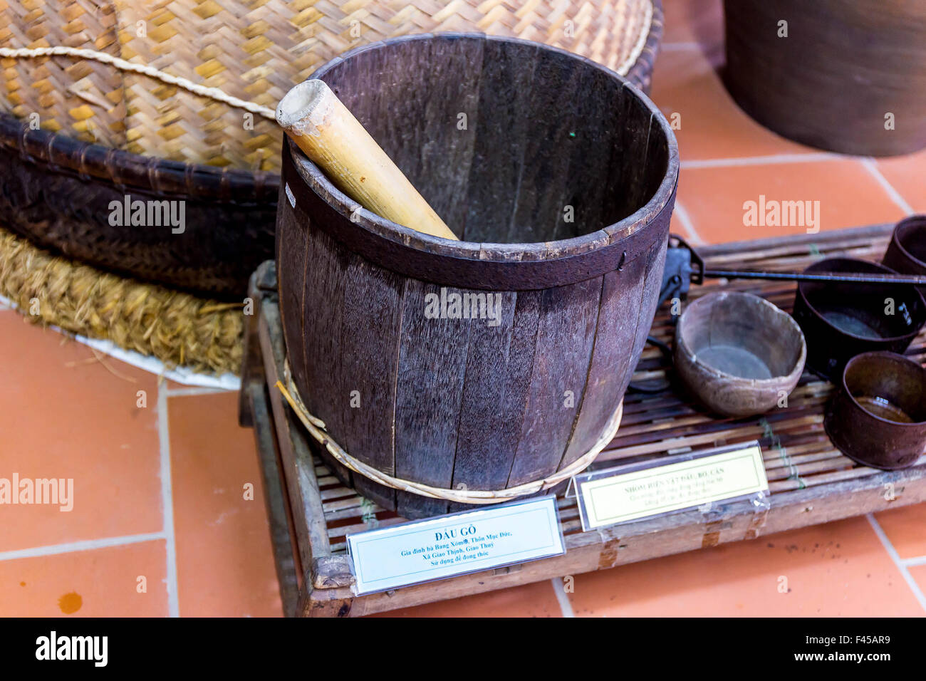 Ancient Vietnamese farming and fishing tools on display Stock Photo - Alamy