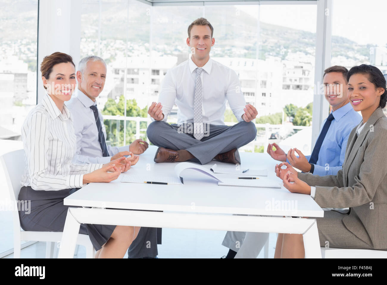 Business team relaxing Stock Photo - Alamy