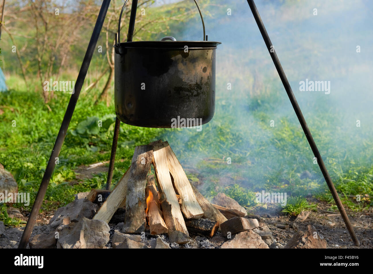 Metal pot food on fire hi-res stock photography and images - Alamy