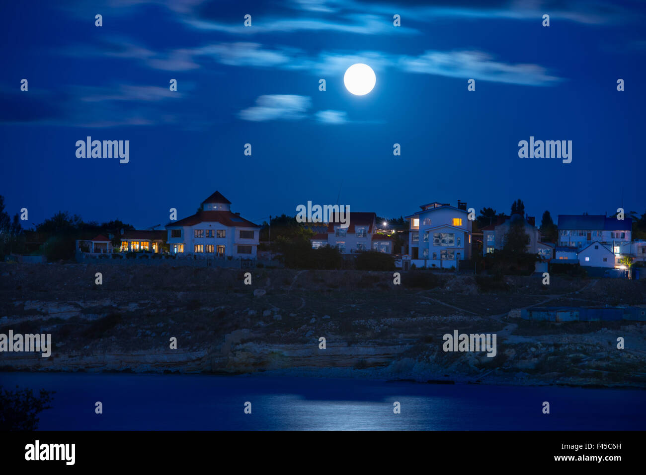 Moon over building hi-res stock photography and images - Alamy