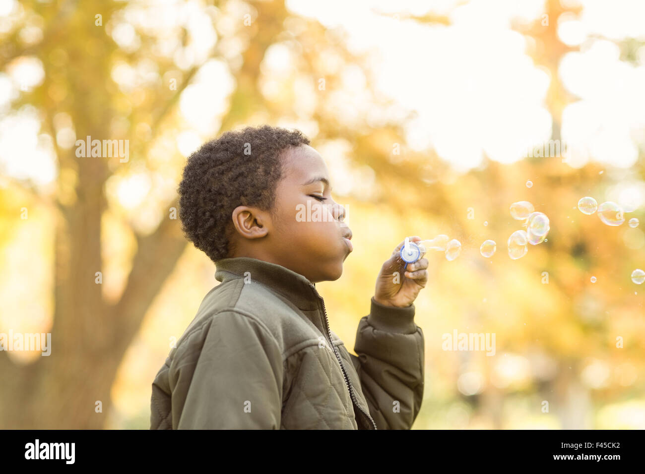 Little boy bubbles nature hi-res stock photography and images - Alamy