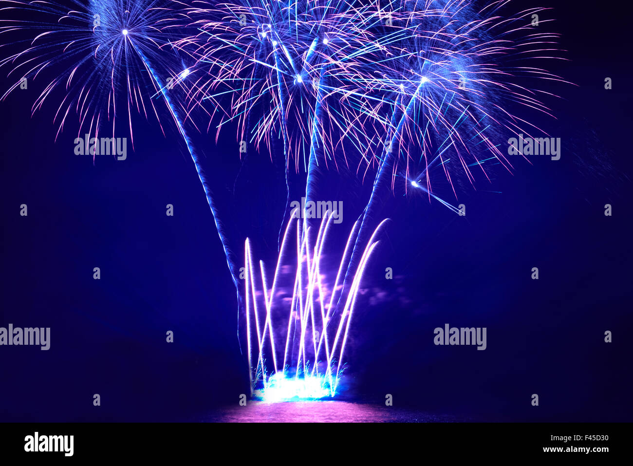 Blue colorful fireworks Stock Photo - Alamy