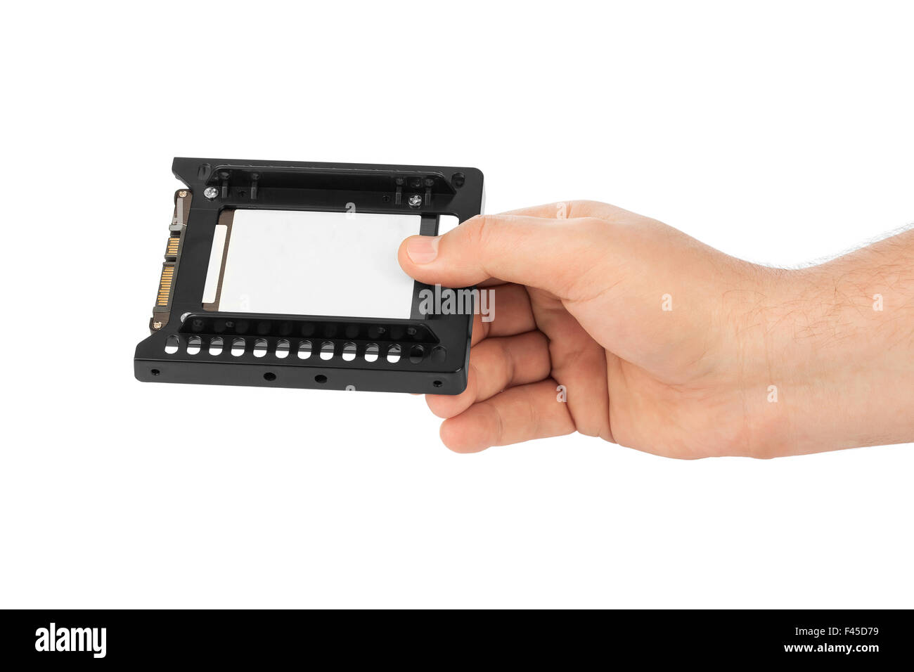 Hand and computer SSD drive Stock Photo - Alamy