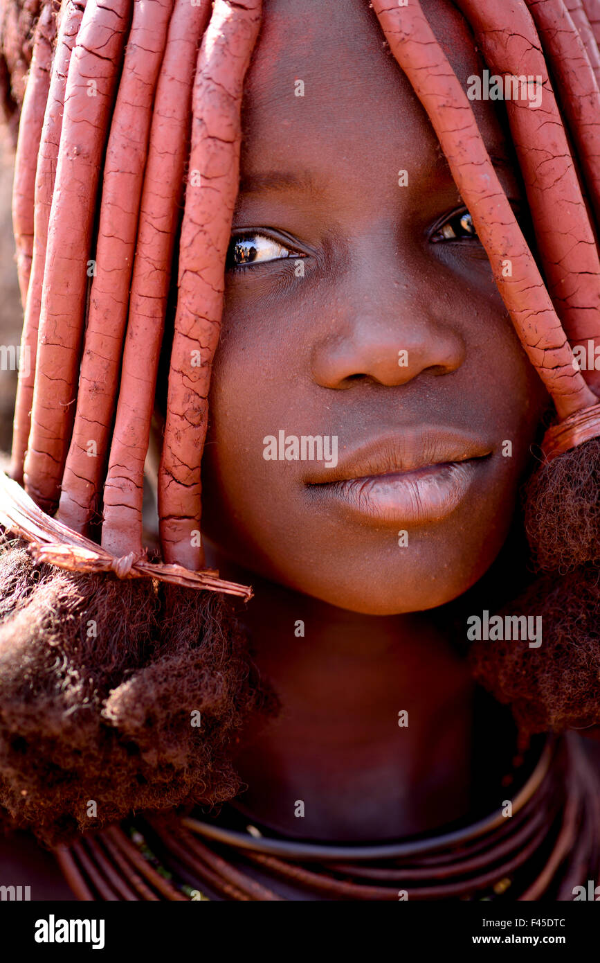 Portrait of Himba woman with characteristic Otjize (a mix of butter ash ...