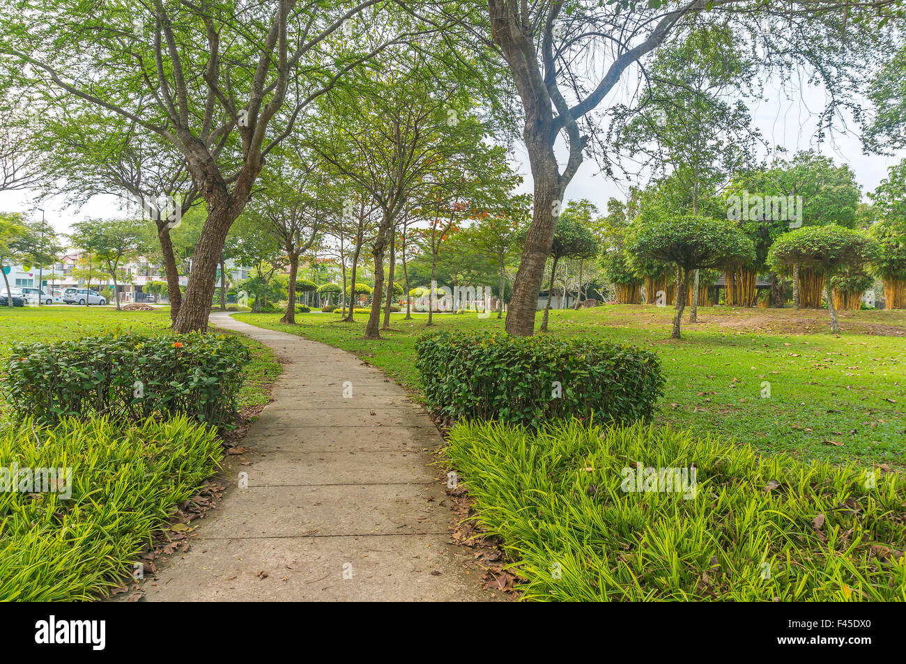 jogging track at green garden Stock Photo - Alamy