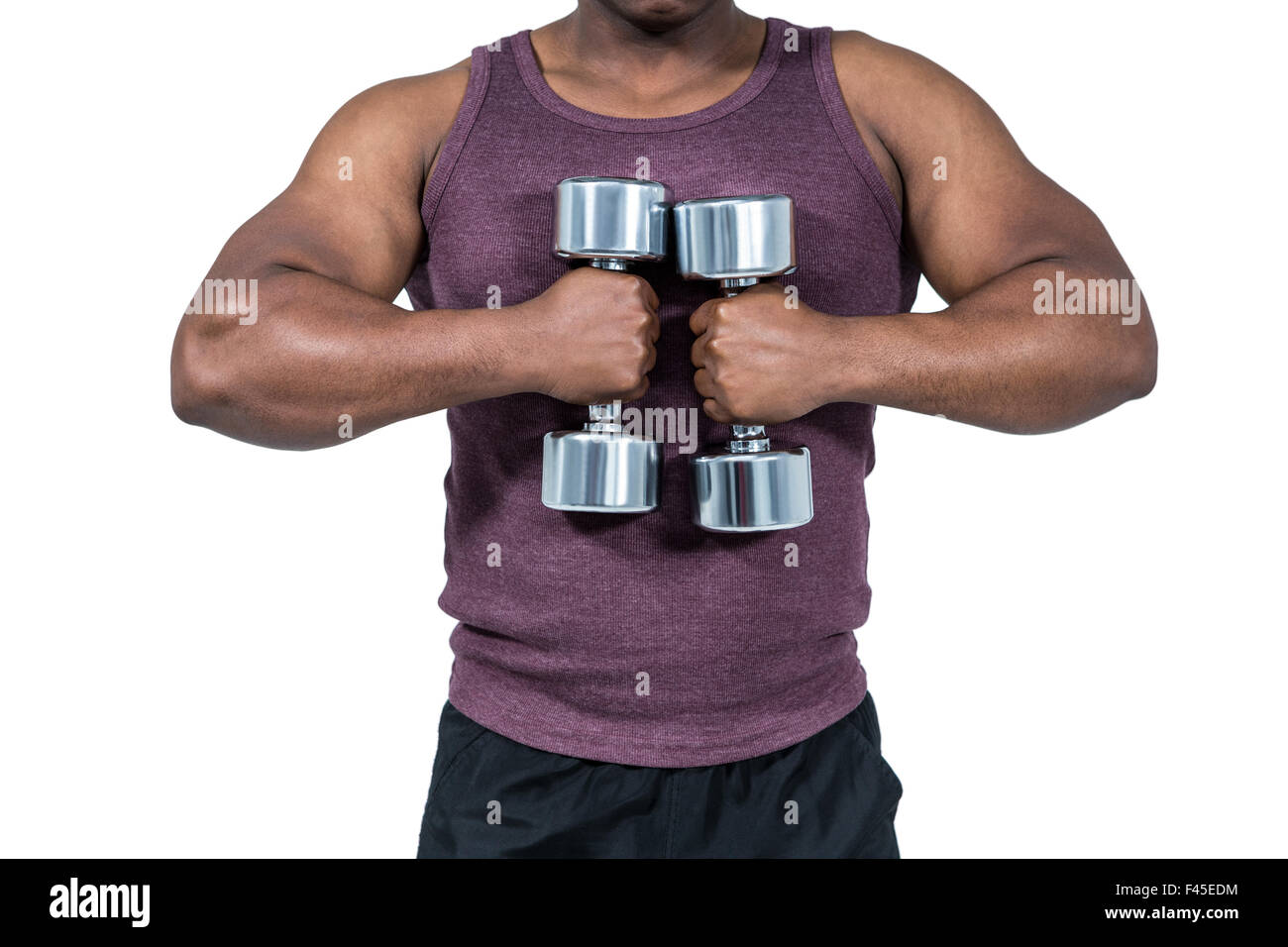 Fit man exercising with dumbbell Stock Photo - Alamy