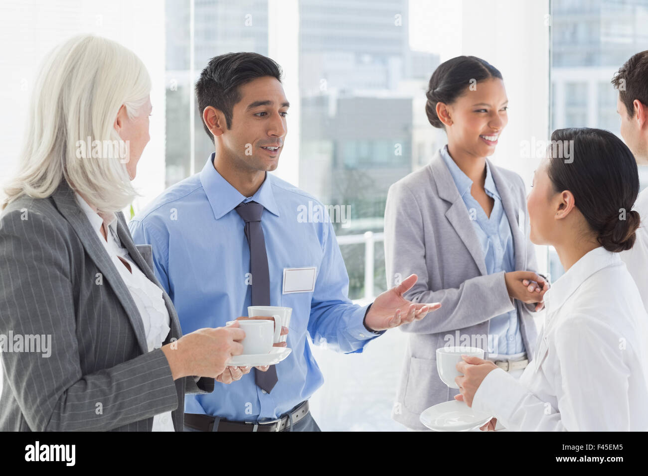 Happy work team during break time Stock Photo - Alamy
