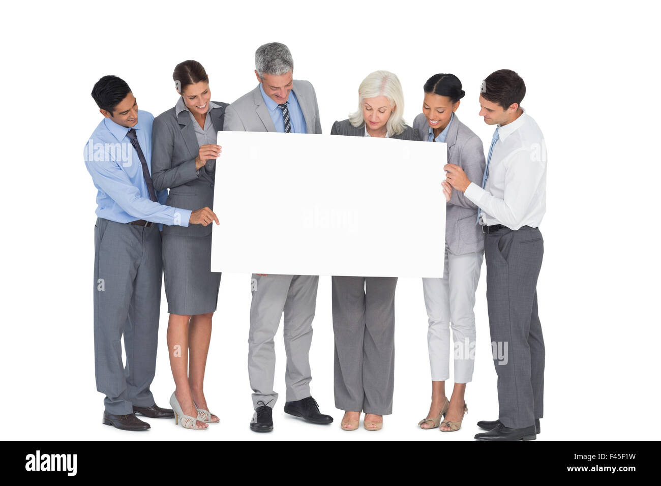 business people holding blank board Stock Photo - Alamy