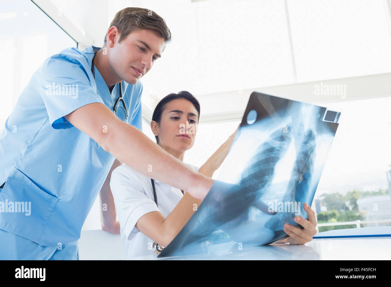 Professional doctors looking ray hi-res stock photography and images ...