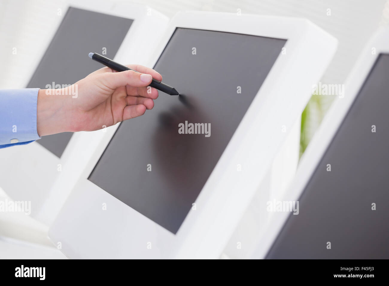 Businessman pointing his screen Stock Photo - Alamy