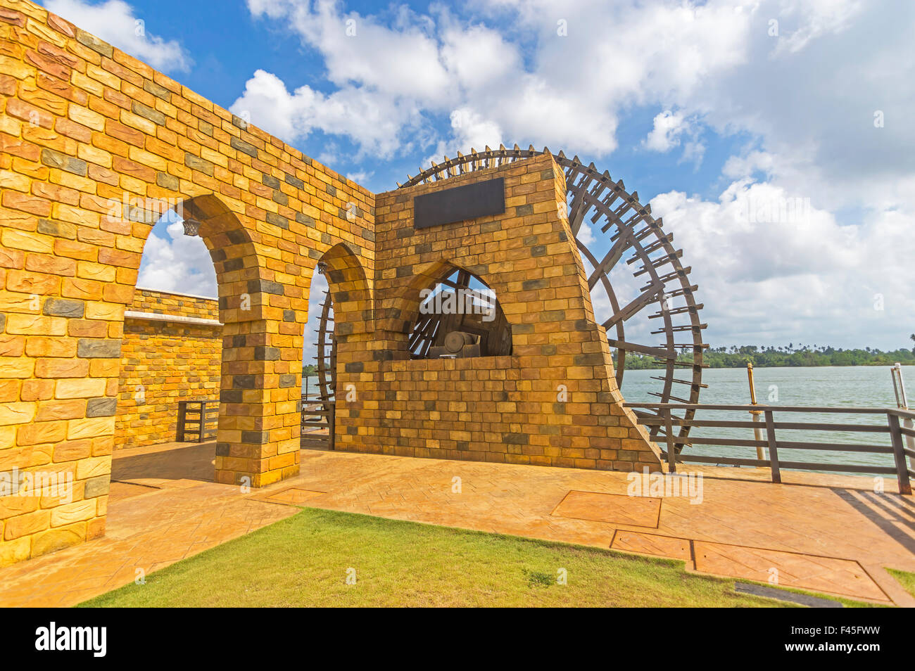 wall water wheel with blue skies Stock Photo - Alamy