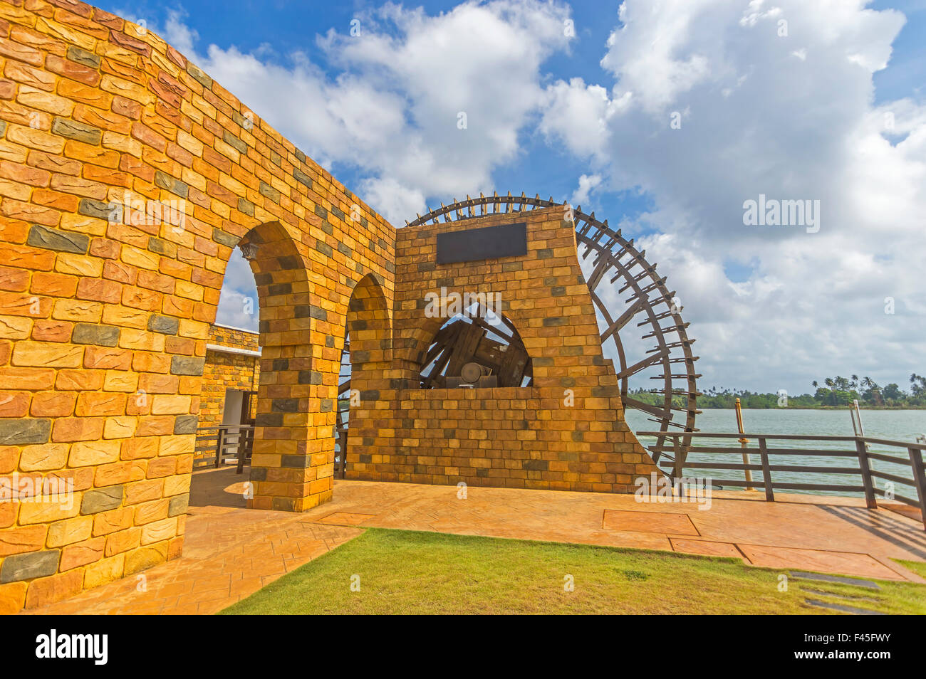 wall water wheel with blue skies Stock Photo - Alamy