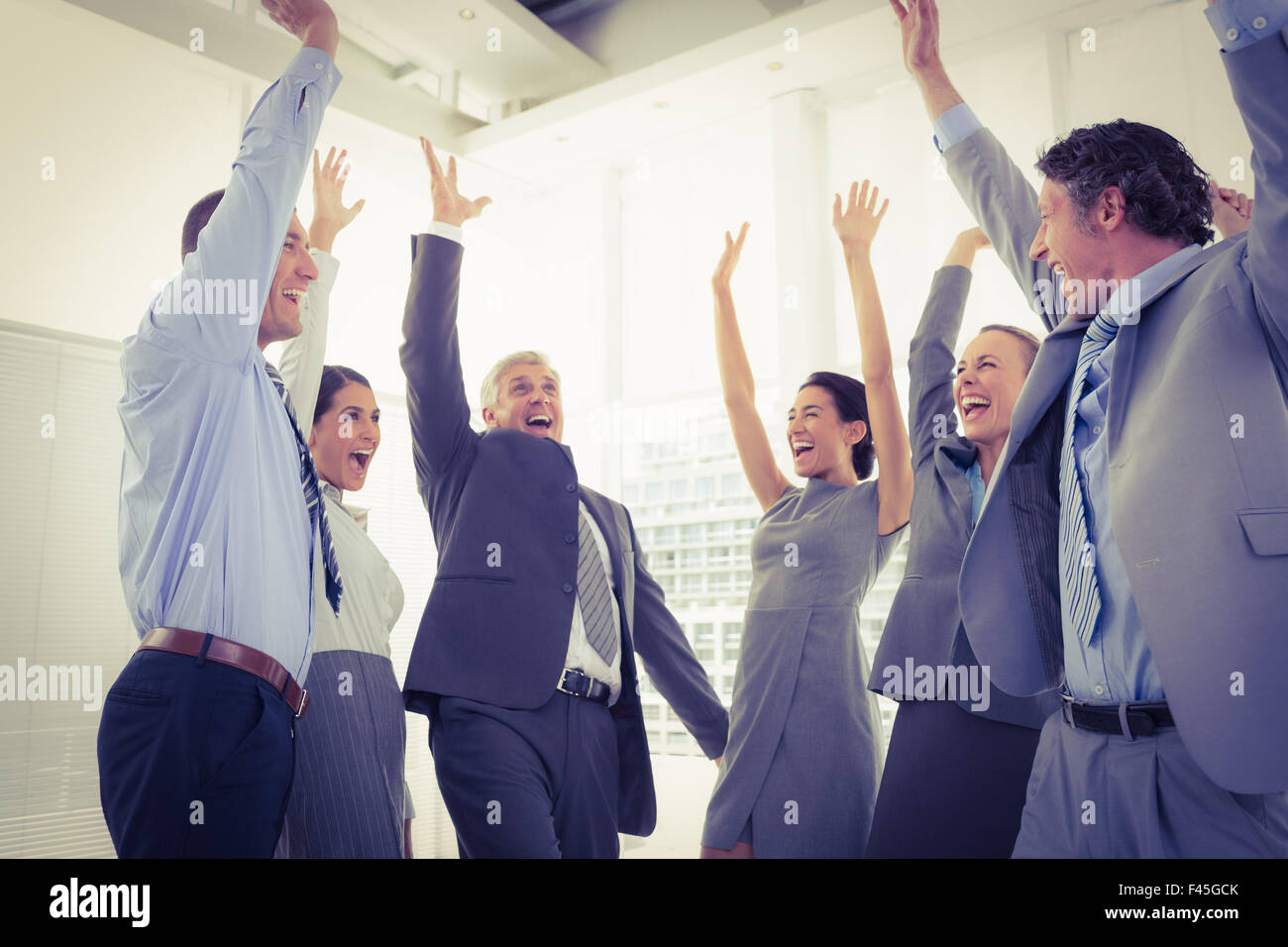 Business team celebrating a good job Stock Photo - Alamy