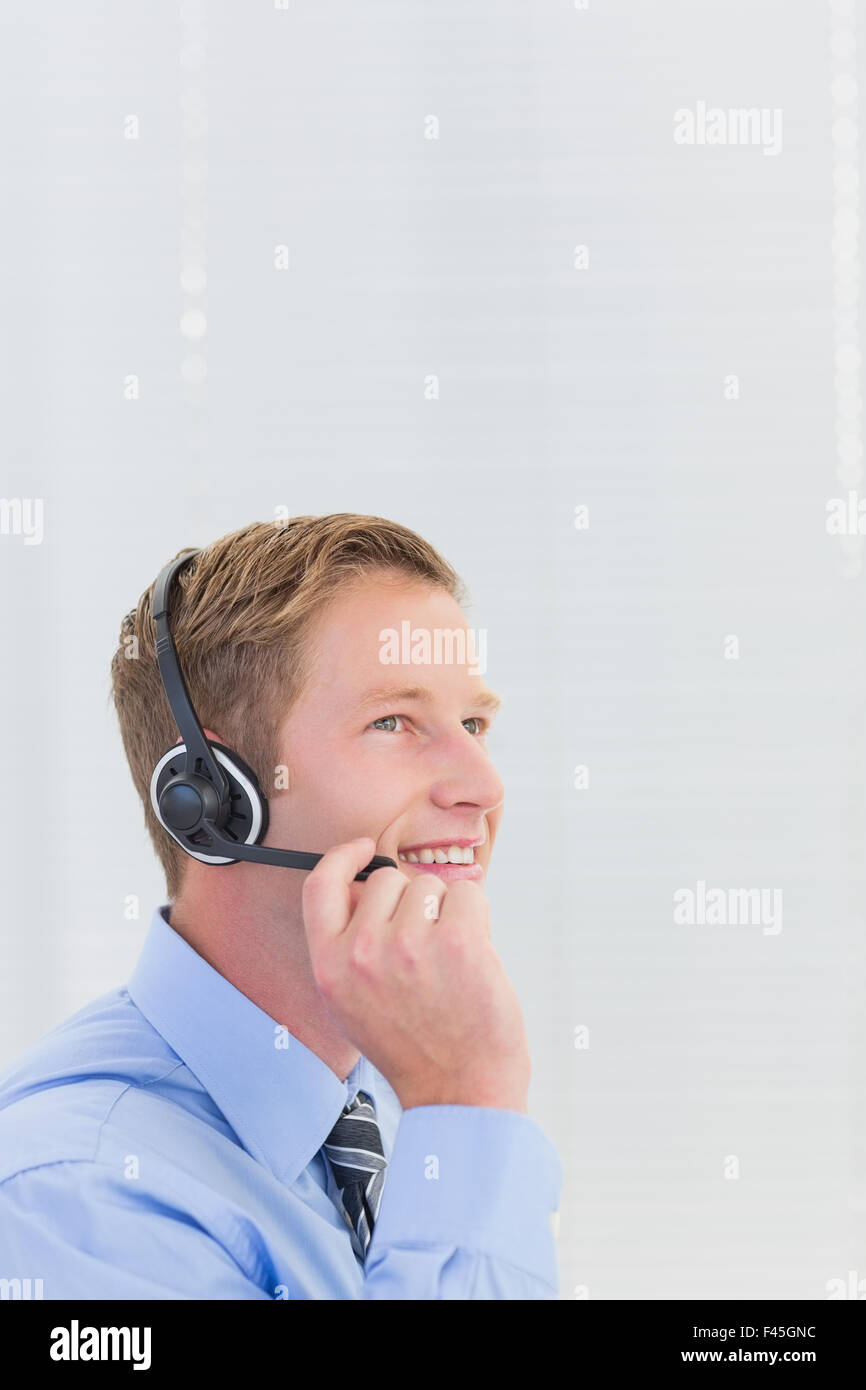 Handsome agent with headset Stock Photo - Alamy