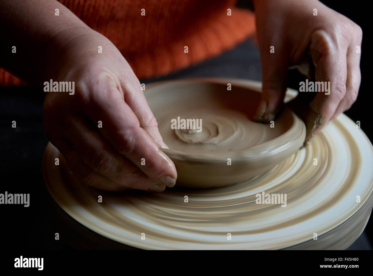 Hands forming clay pot Stock Photo - Alamy