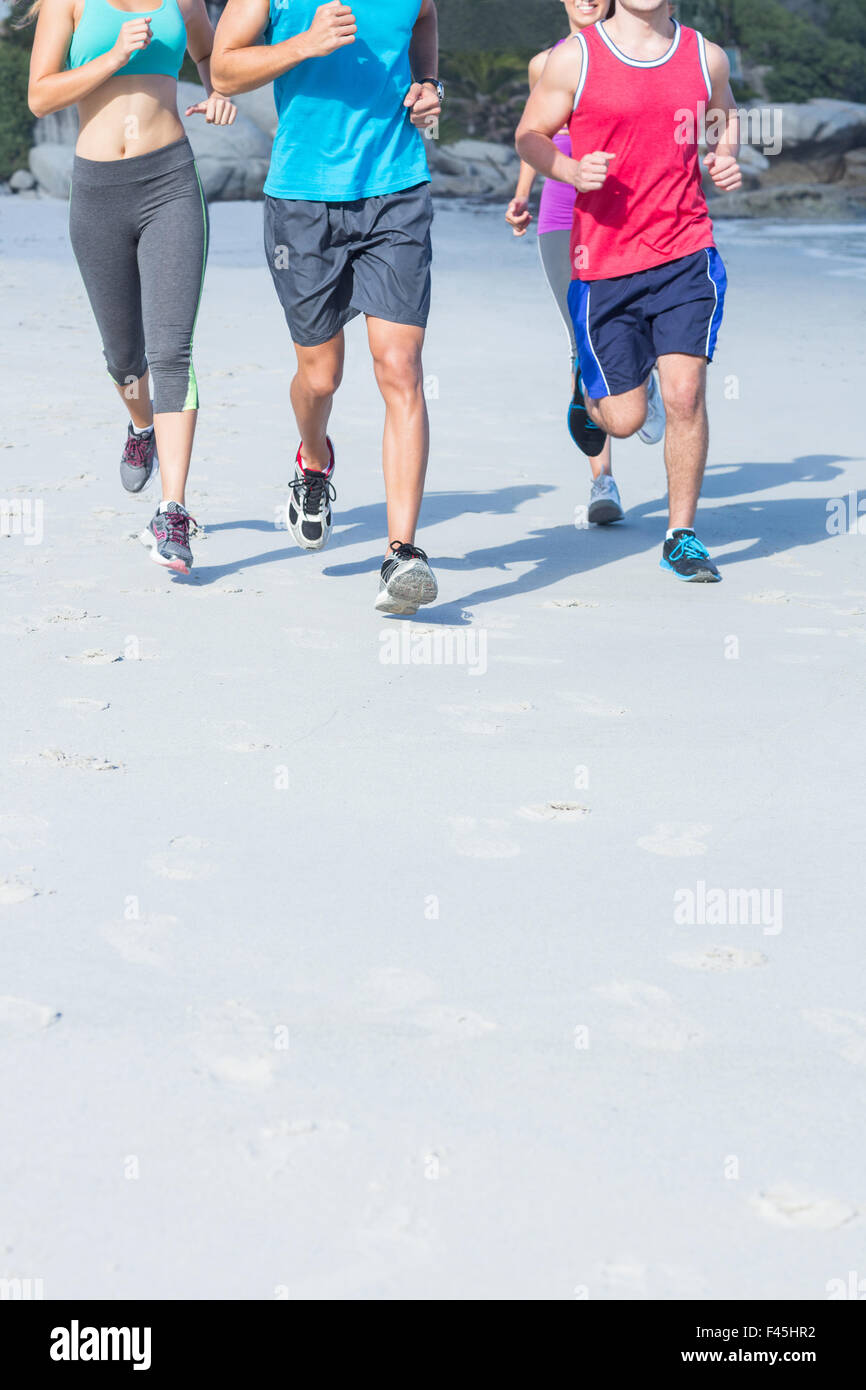 Friends doing jogging together Stock Photo - Alamy