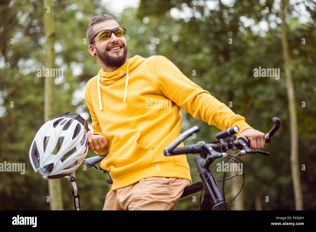 Man with bike hi-res stock photography and images - Alamy