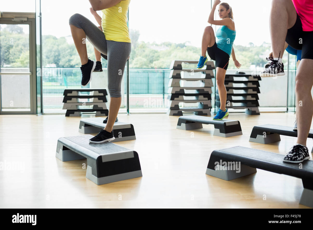Fitness class exercising in the studio Stock Photo - Alamy