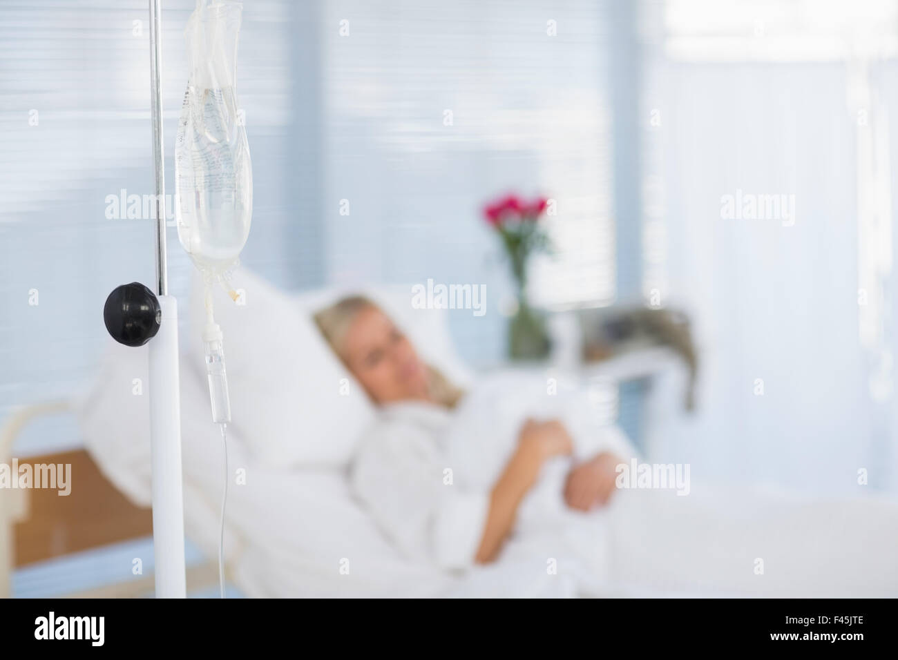 Fuzzy view of patient lying on her bed Stock Photo - Alamy