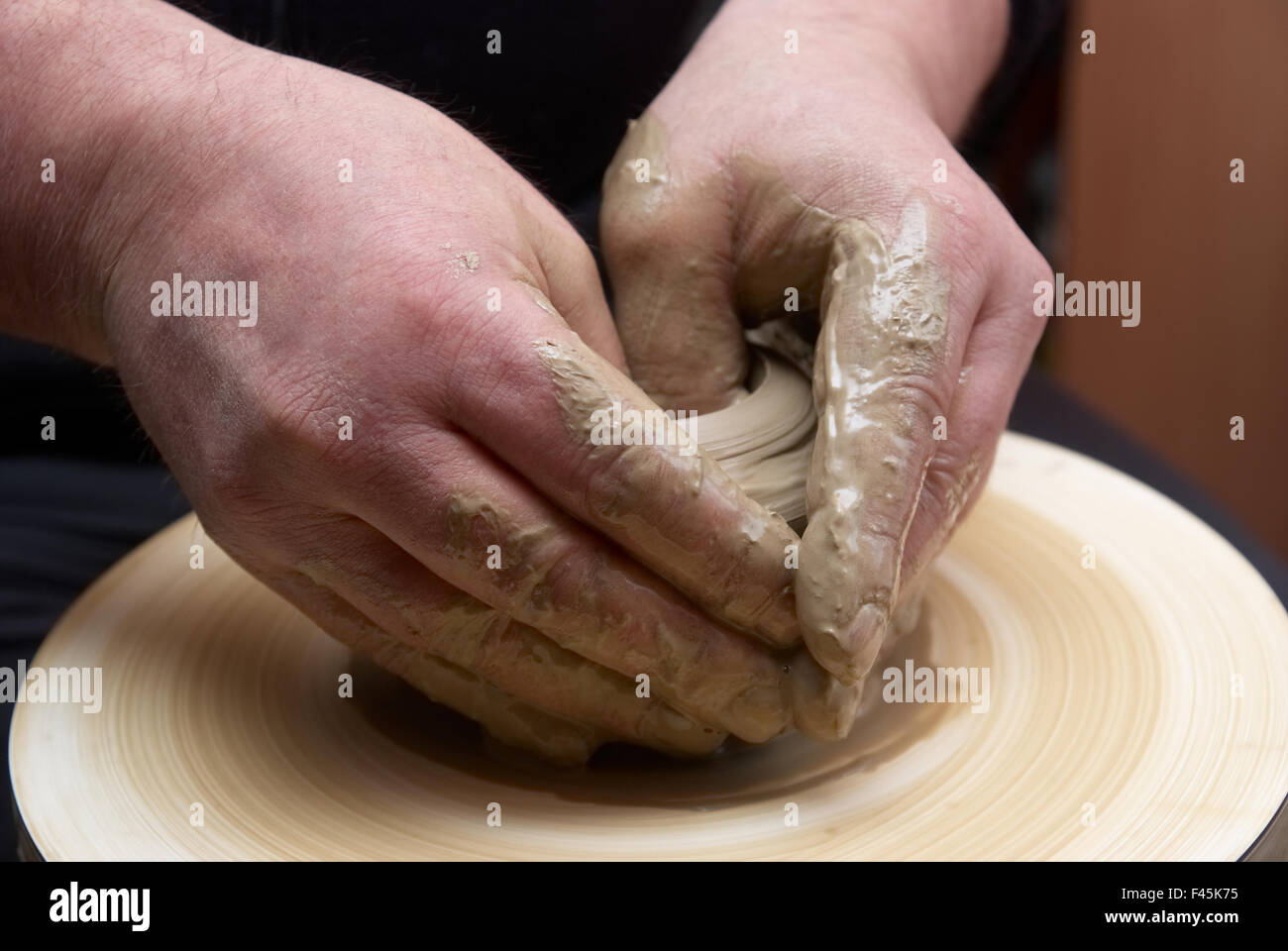 Hands forming clay pot Stock Photo - Alamy
