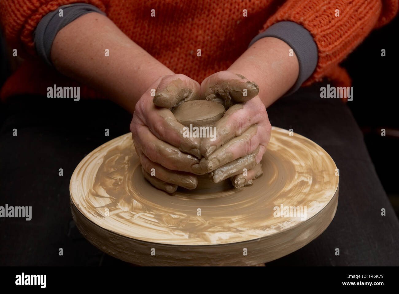 Hands forming clay pot Stock Photo - Alamy