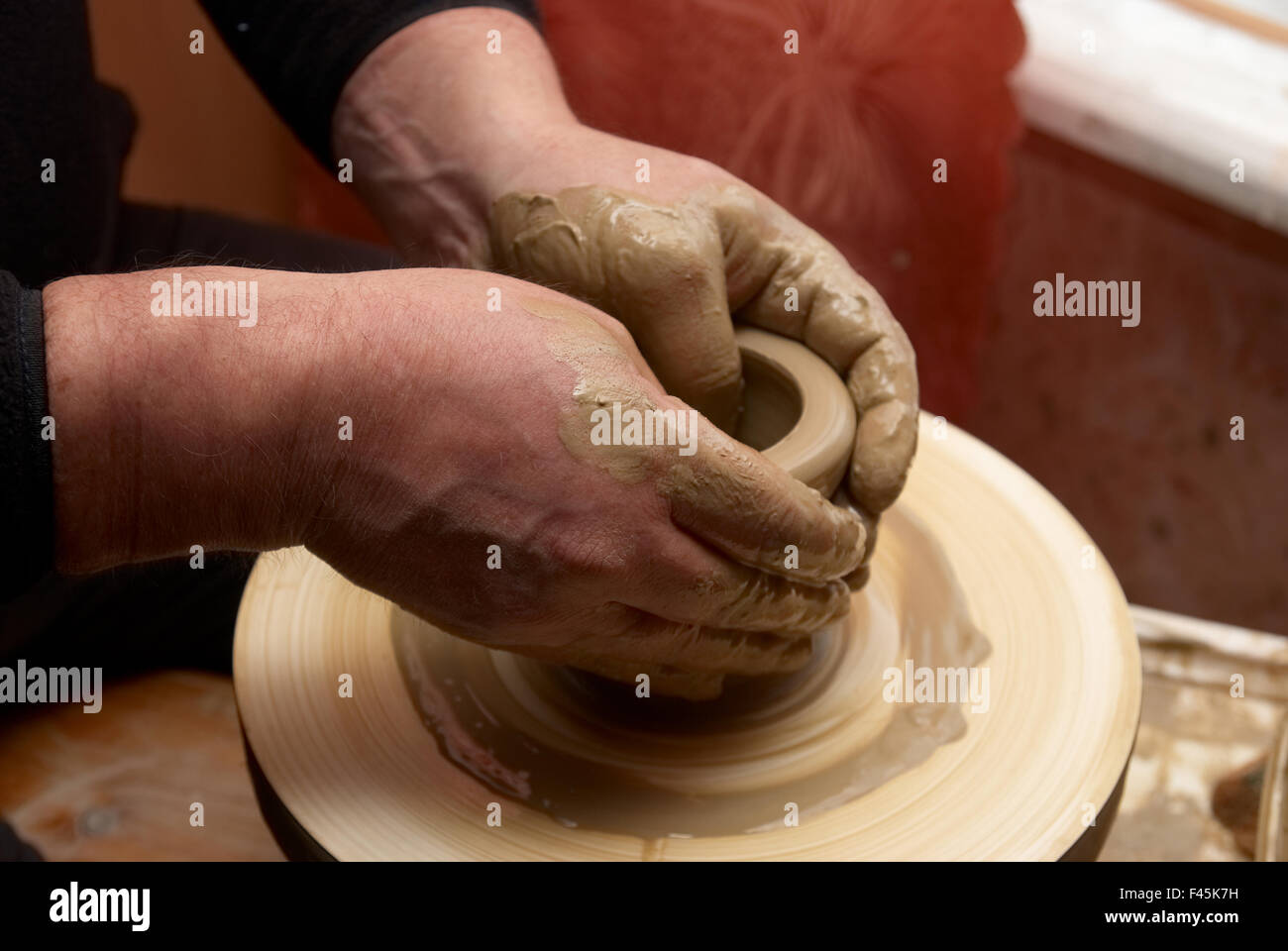 Hands forming clay pot Stock Photo - Alamy
