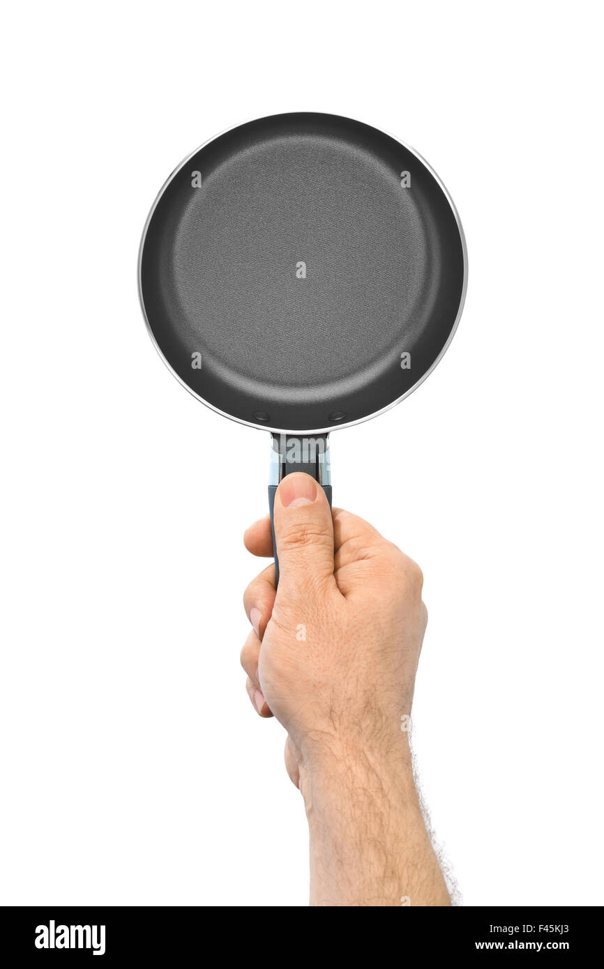 Hand with frying pan Stock Photo - Alamy