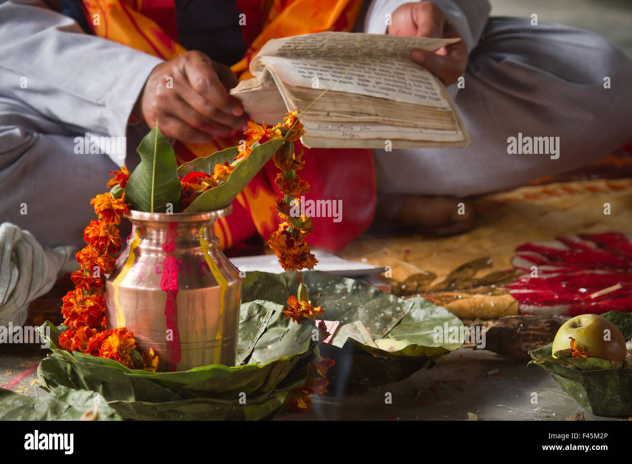 Brahman reading mantra during hindu nepali puja Stock Photo - Alamy