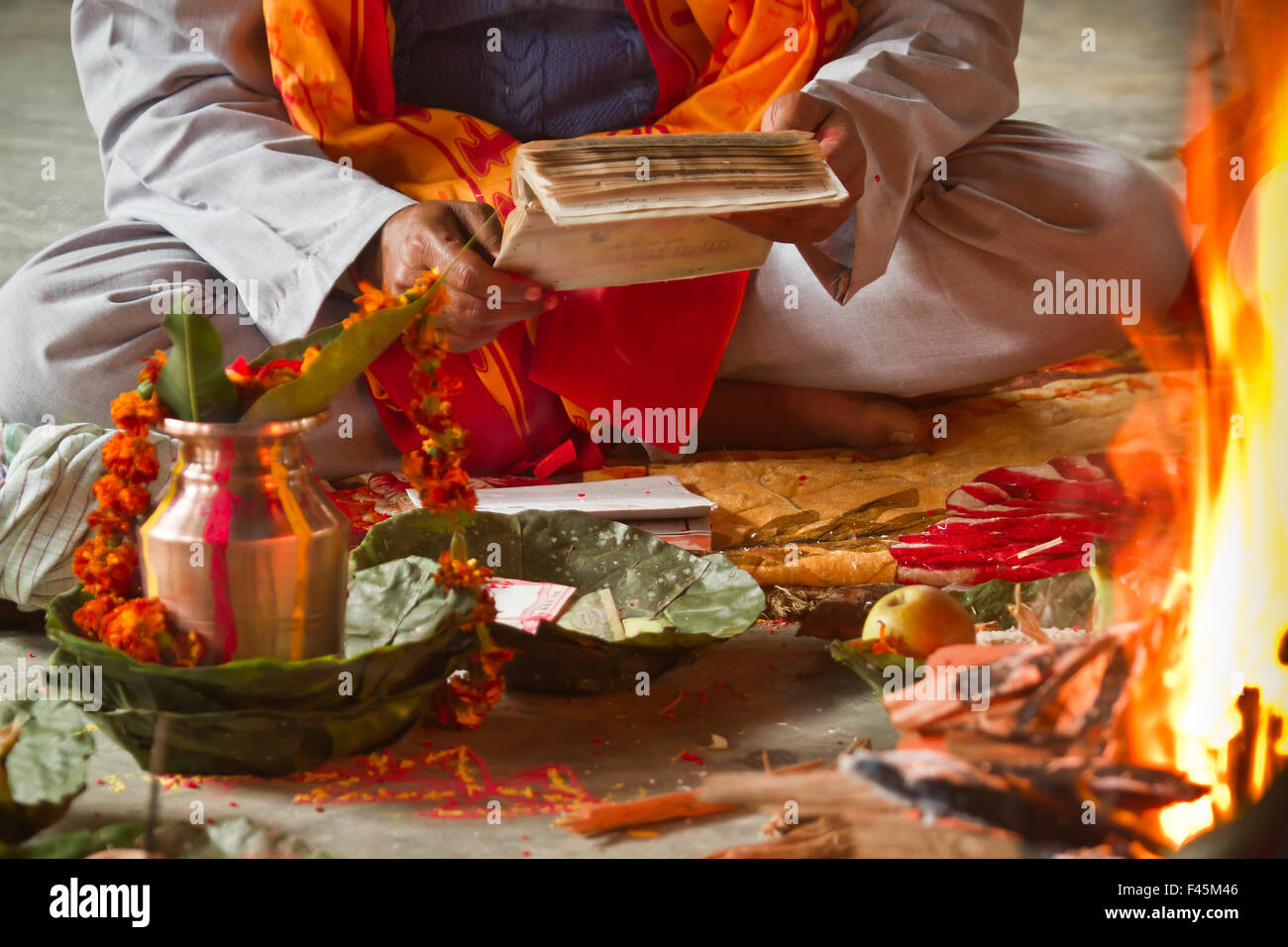 Brahman reading mantra during hindu nepali puja Stock Photo - Alamy