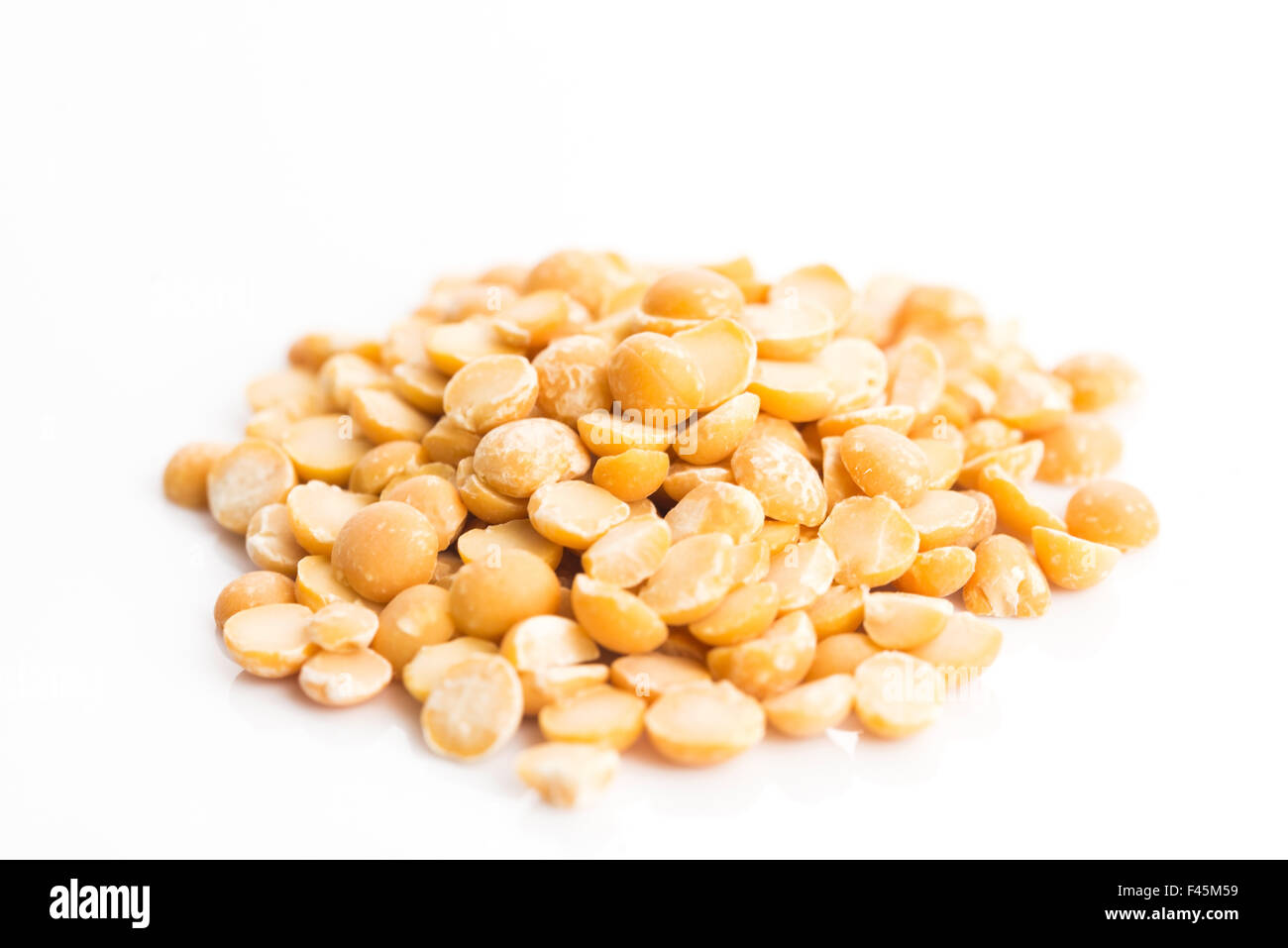 Yellow split peas isolated on white background Stock Photo - Alamy