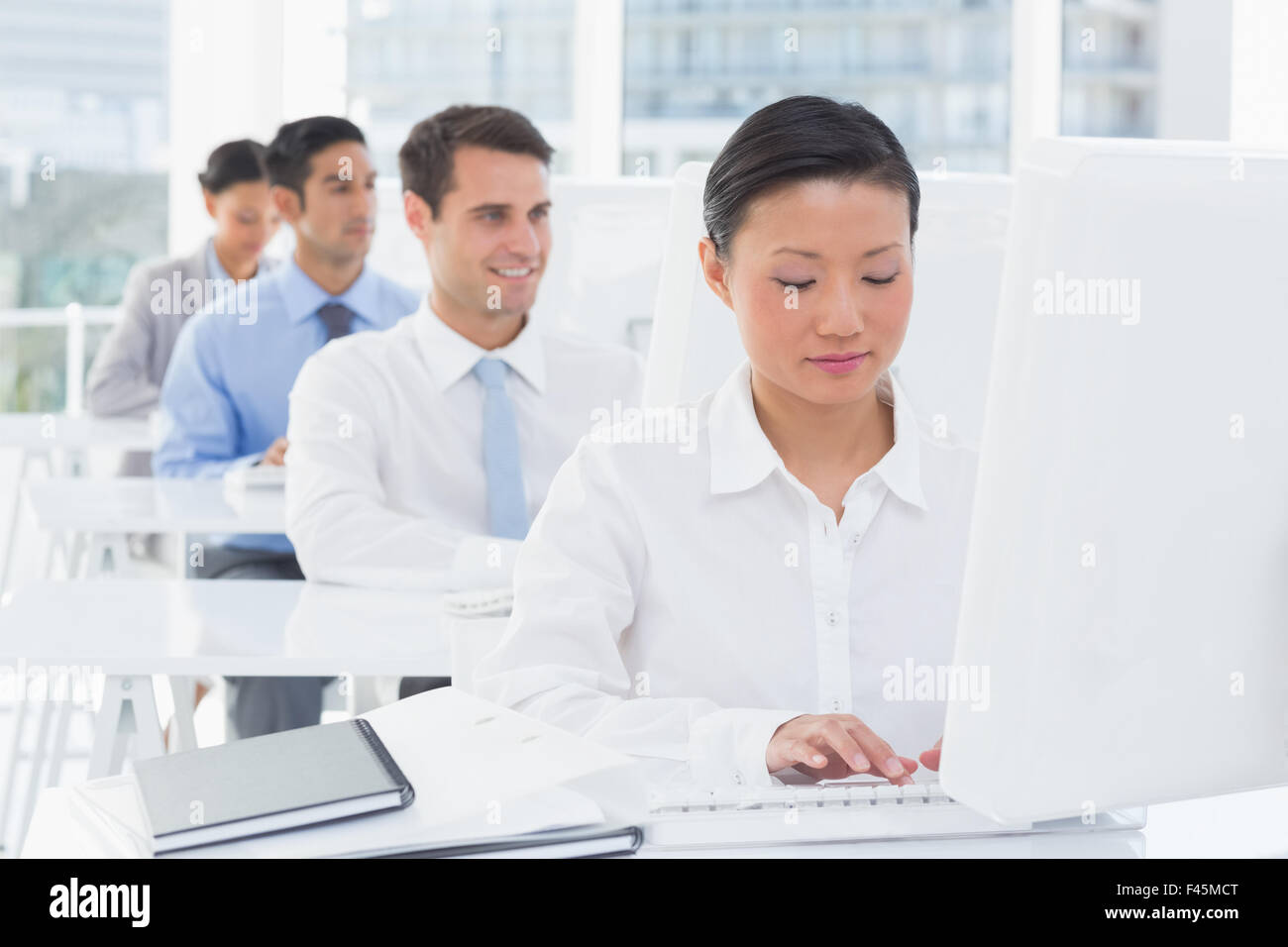 Concentrate work team using computer Stock Photo - Alamy