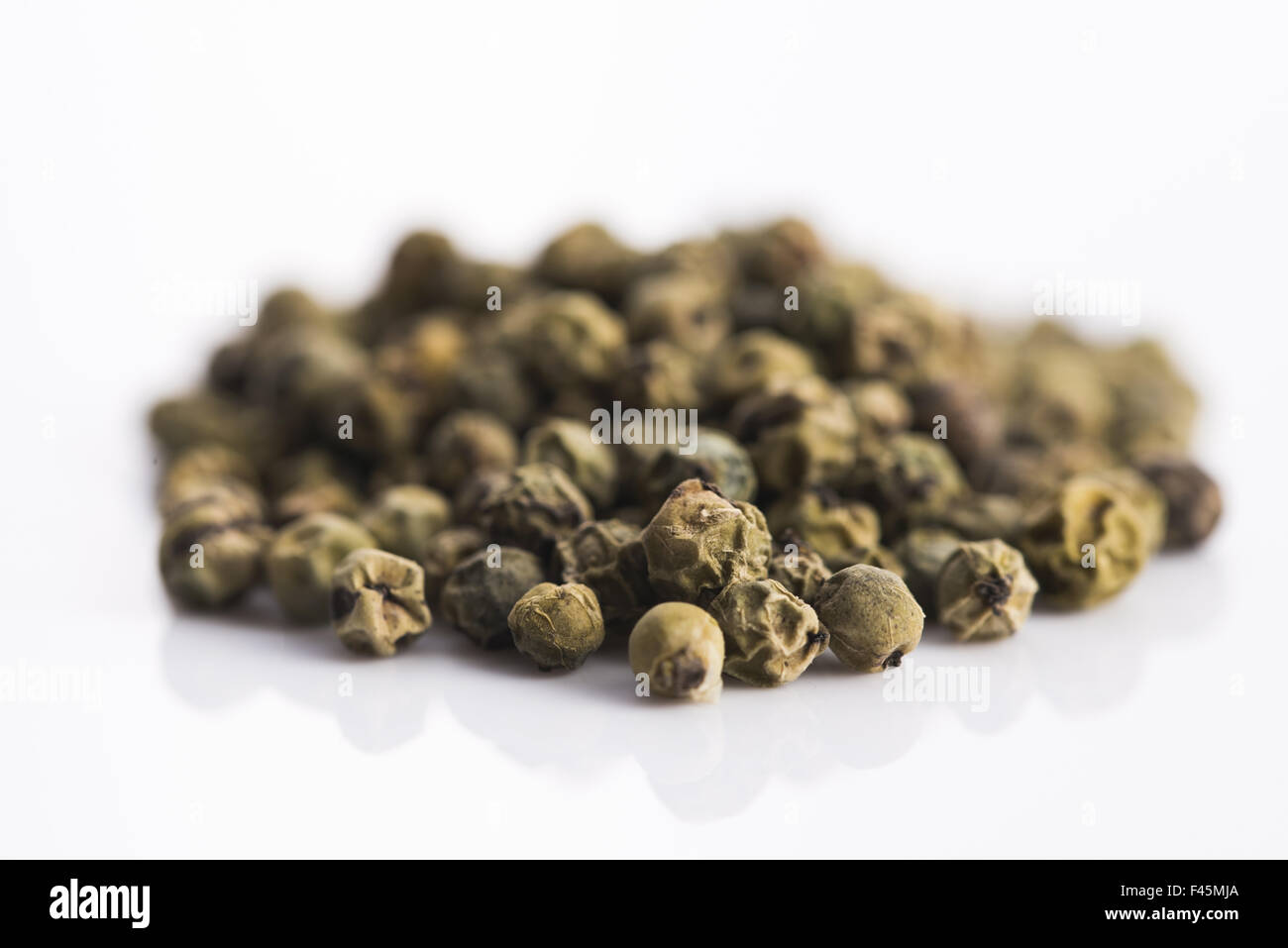 Whole Green Pepper On White Background Stock Photo - Alamy