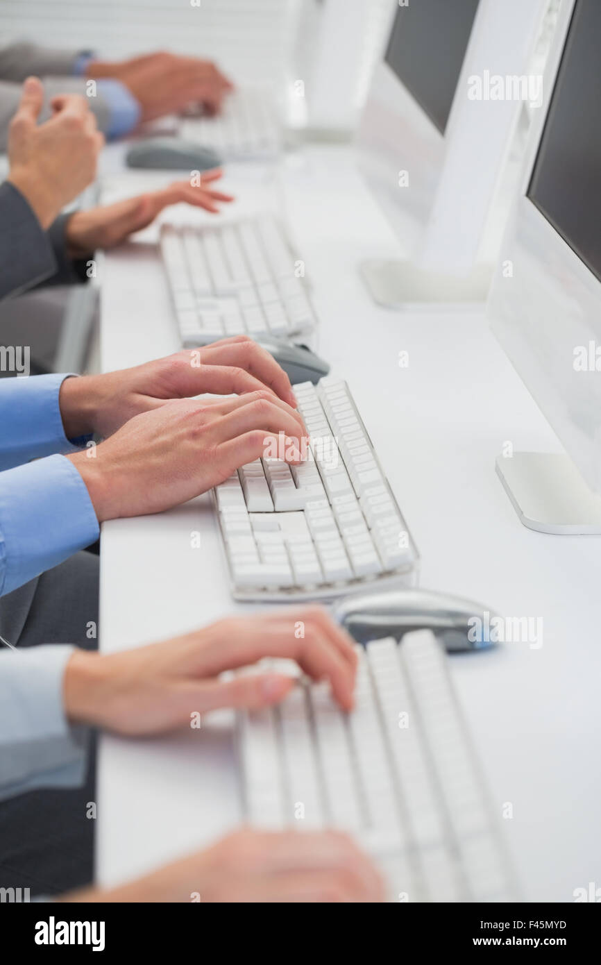 Business team working on computers Stock Photo - Alamy