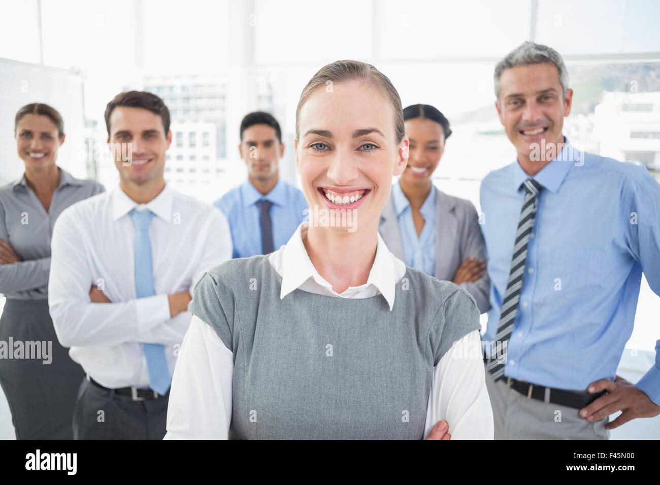 Business people looking at camera Stock Photo - Alamy