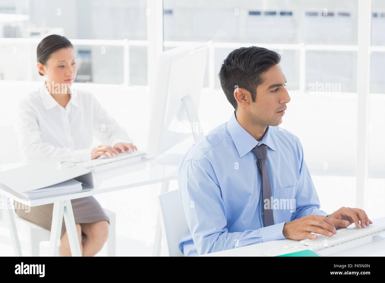 Concentrate work team using computer Stock Photo - Alamy
