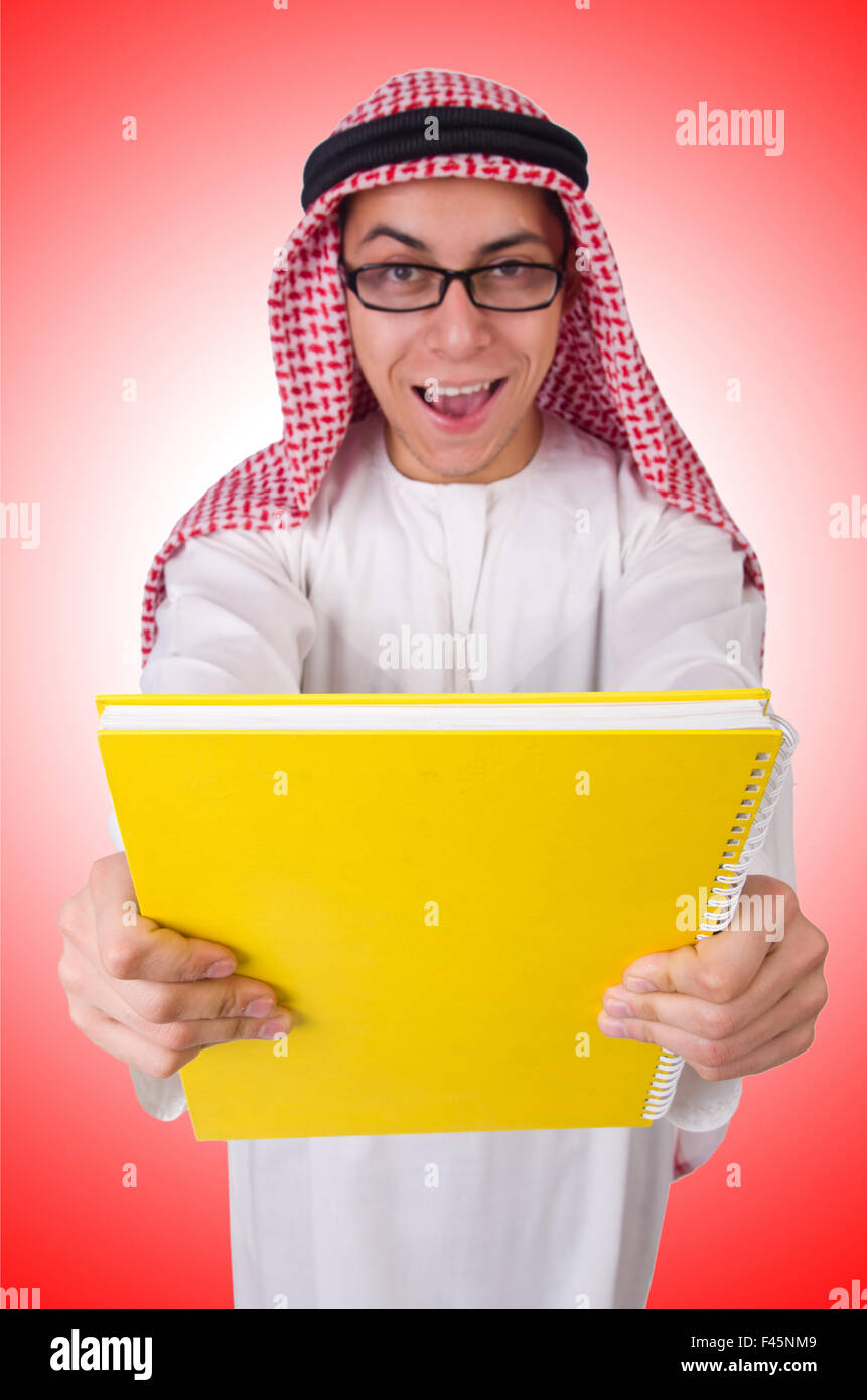 Arab male student reading hi-res stock photography and images - Alamy