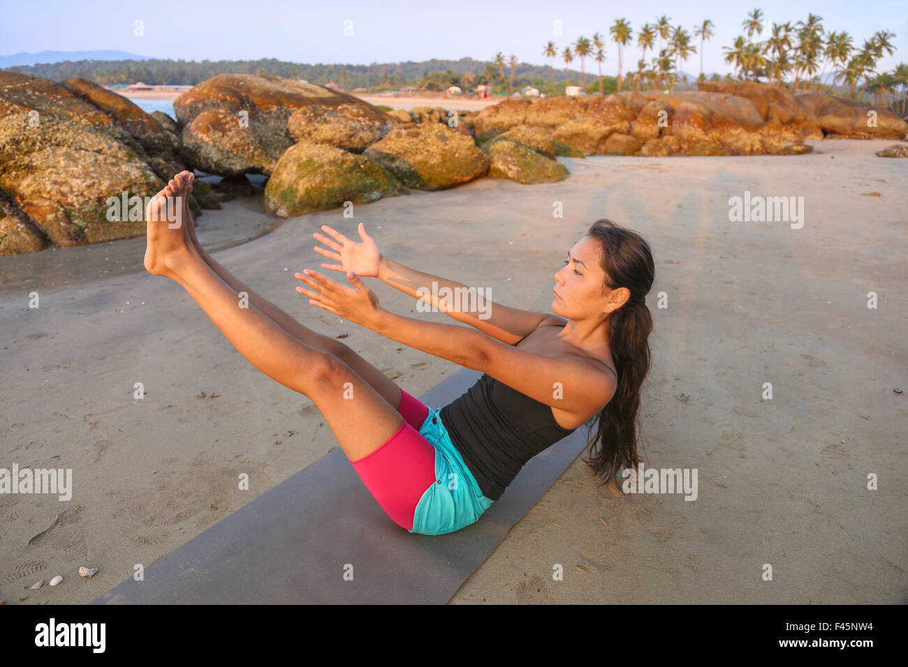 Beautiful woman doing yoga Stock Photo - Alamy