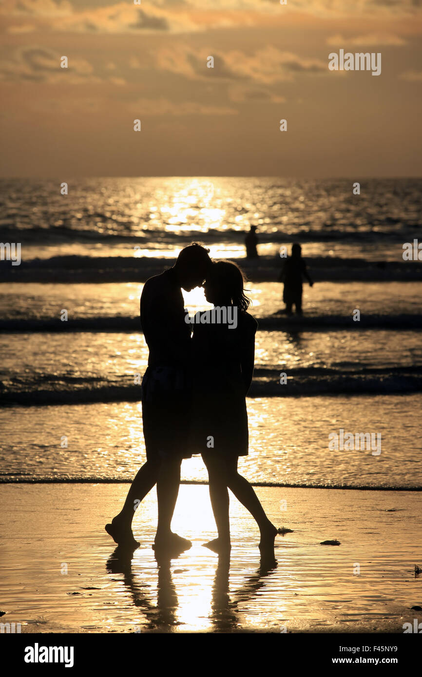 Couple on sunset Stock Photo - Alamy